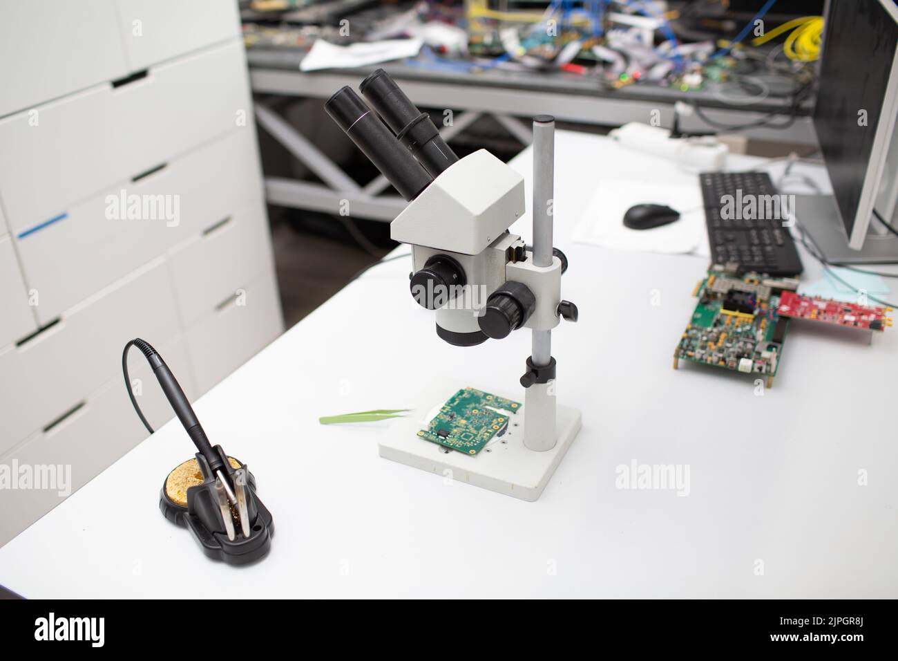 Microscope and soldering iron in Scientific research tech Laboratory ...