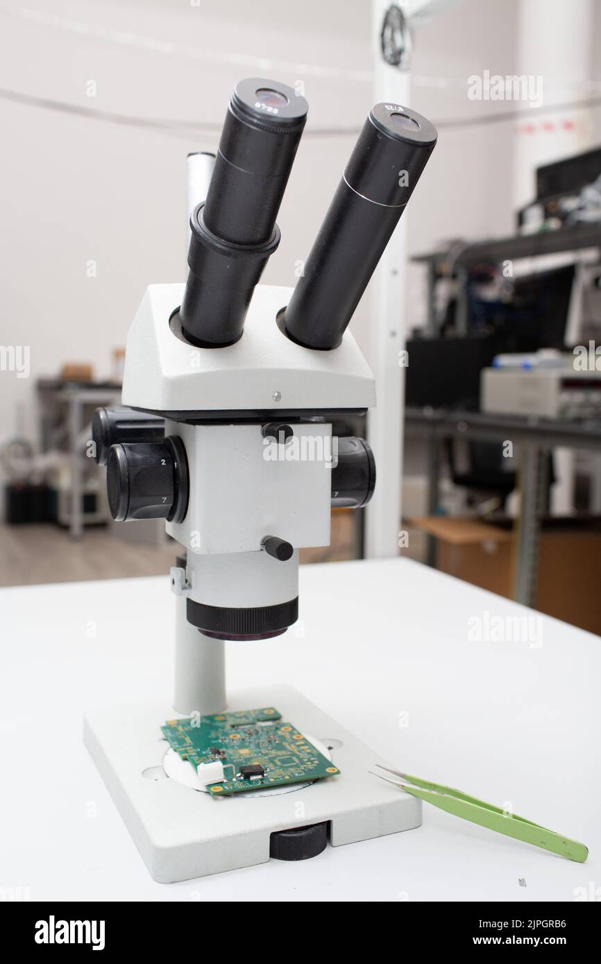 Microscope and soldering iron in Scientific research tech Laboratory ...
