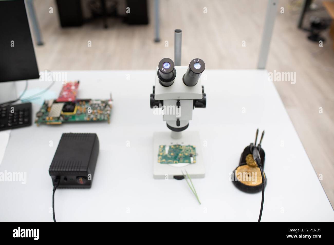 Microscope and soldering iron in Scientific research tech Laboratory ...
