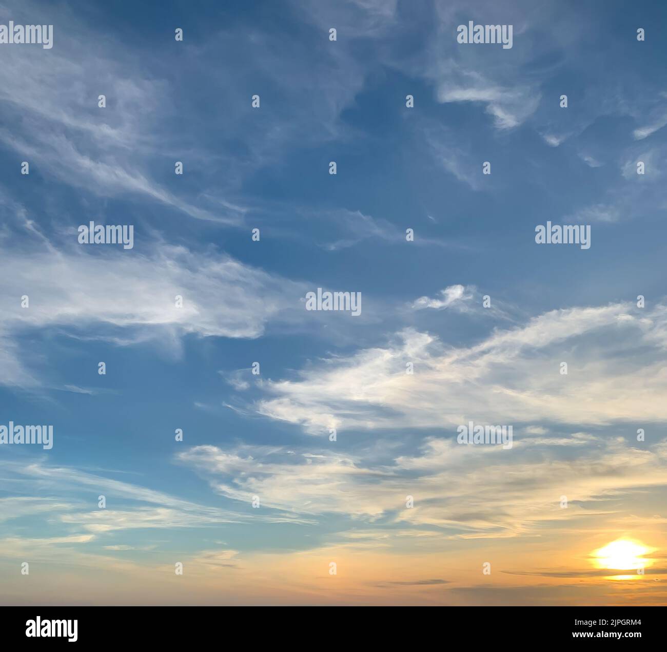 Beautiful sunset sky with some clouds during summer on a nice day Stock ...