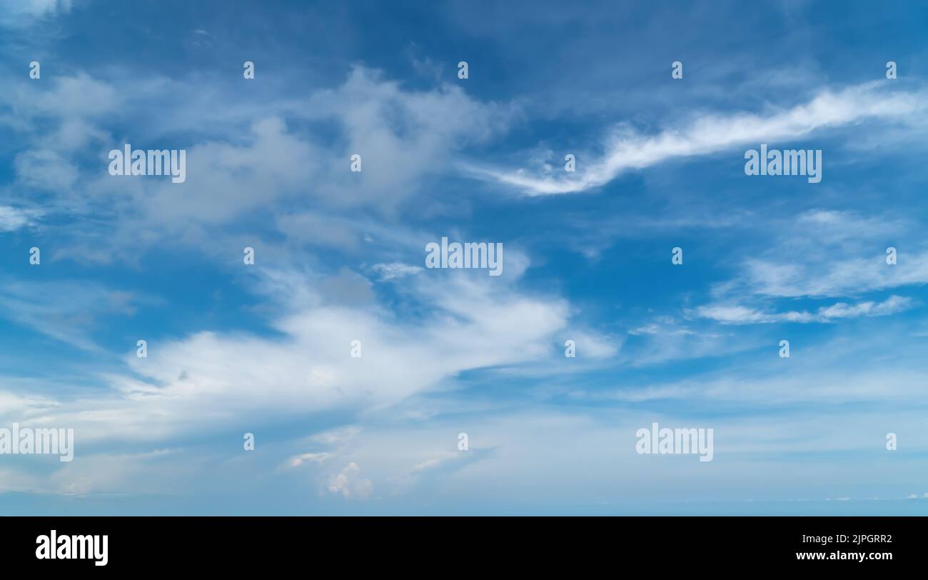 Beautiful blue sky with some clouds during summer on a nice day Stock Photo - Alamy