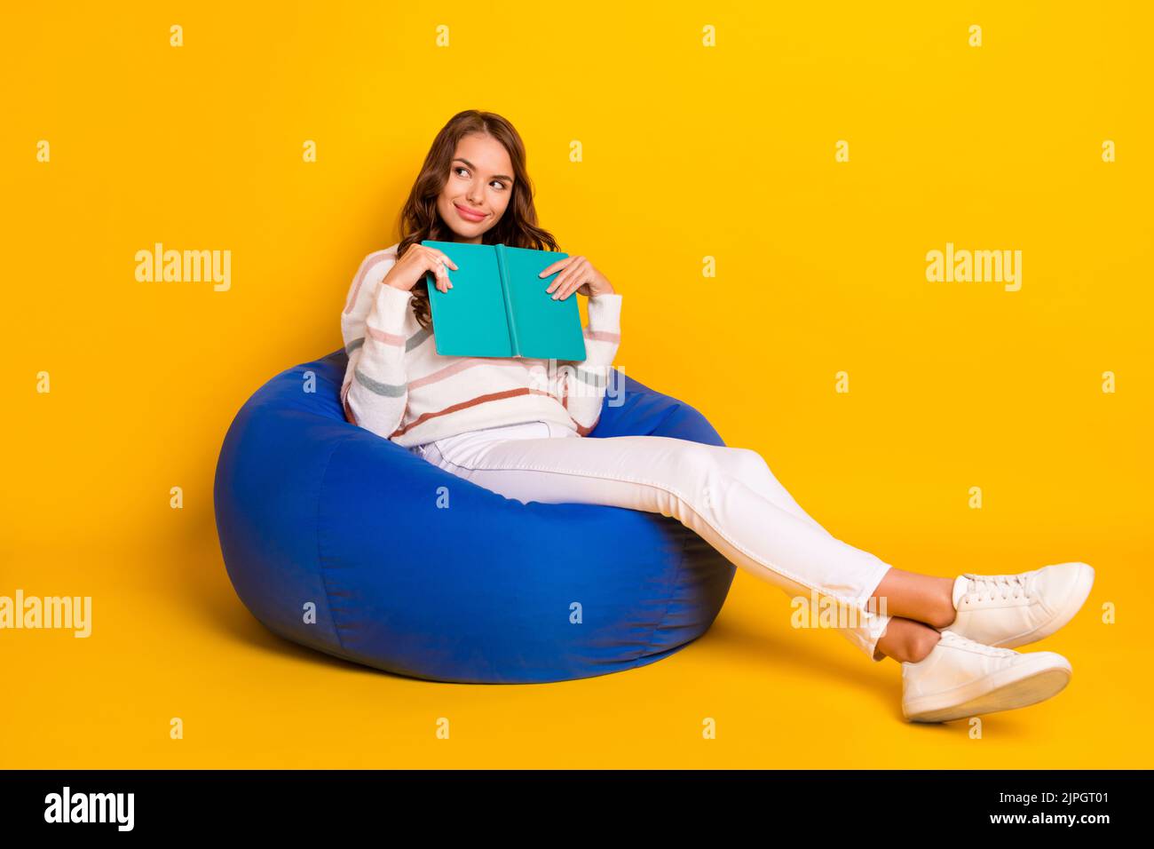 Full length body photo of young smart clever woman sitting pouf reading ...