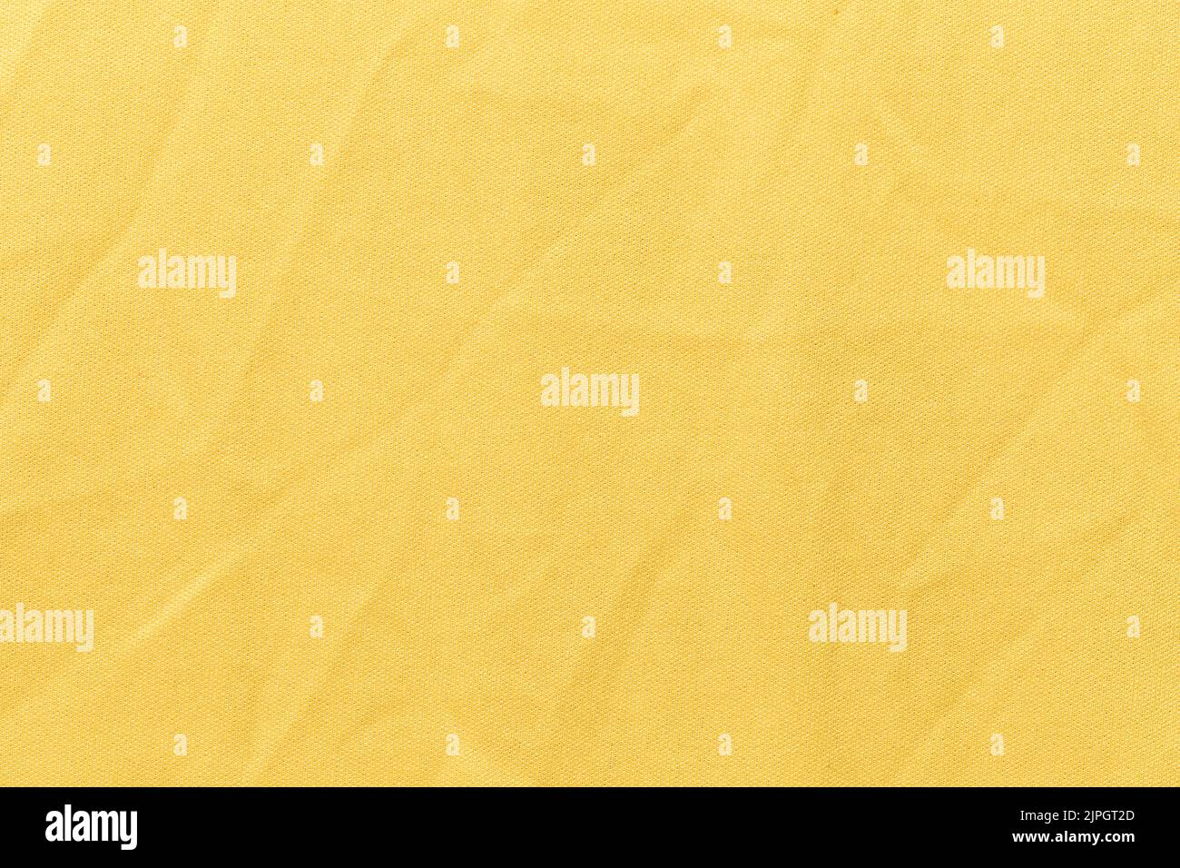 Clothing Yellow color fabric texture background, top view of cloth ...