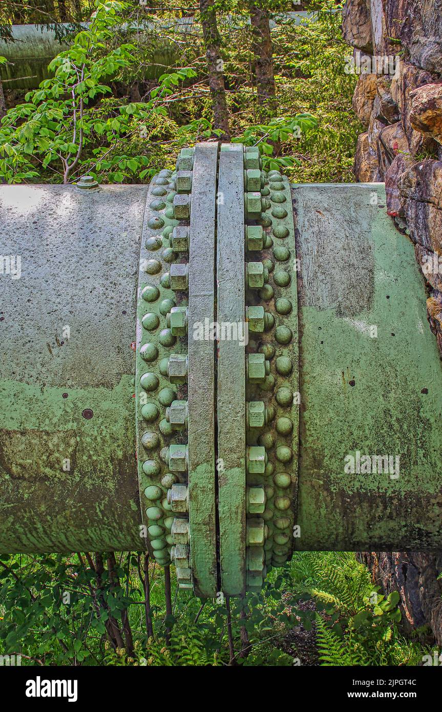 Connection of two pipes by means of bolts and nuts of a water pipeline ...