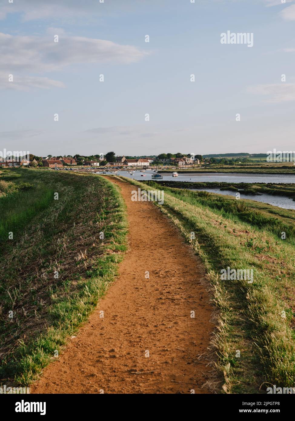 Walking the raised Norfolk Coastal Path to Burnham Overy Staithe in the ...