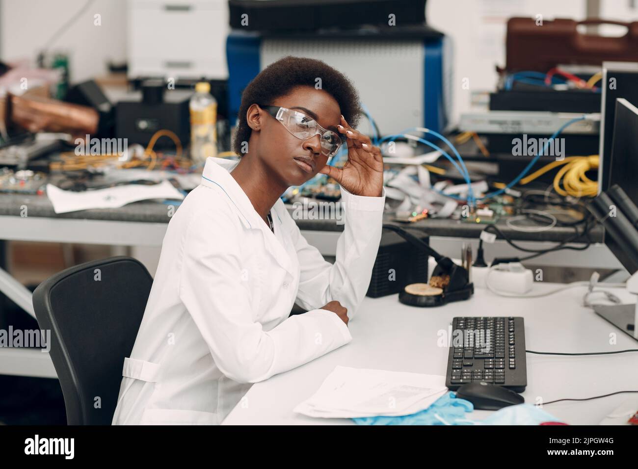 Scientist african american woman working in laboratory with computer ...