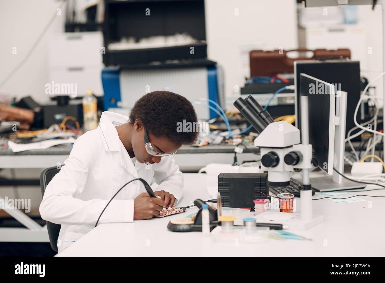 Woman soldering hi-res stock photography and images - Alamy