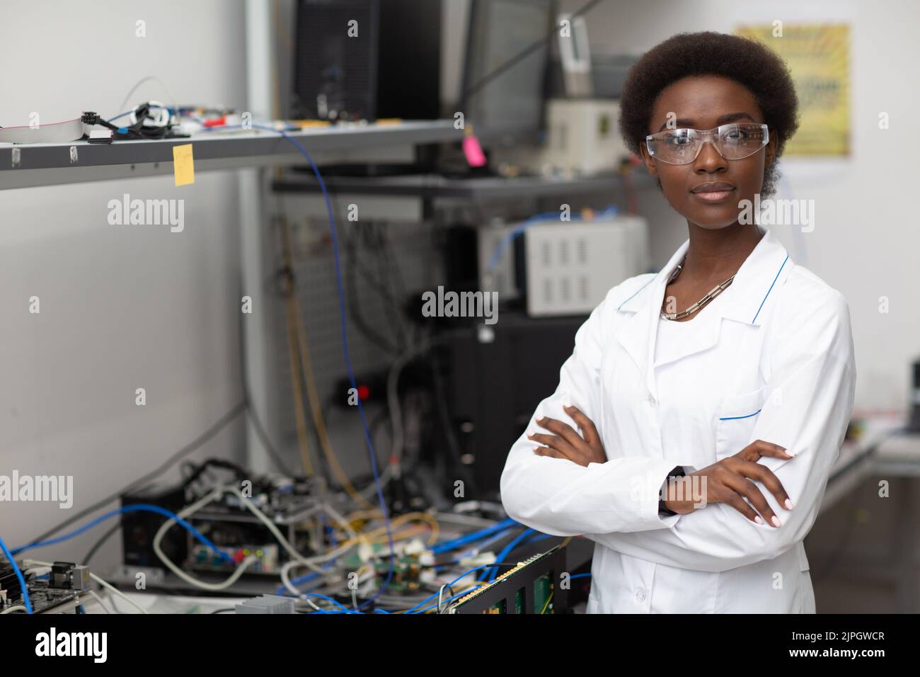 Scientist african american woman standing and looking at camera in ...
