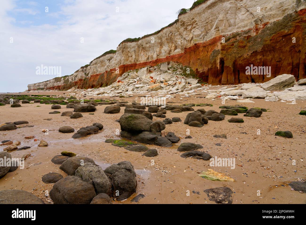 New rock fall from the carrstone and chalk cliffs on Hunstanton beach ...