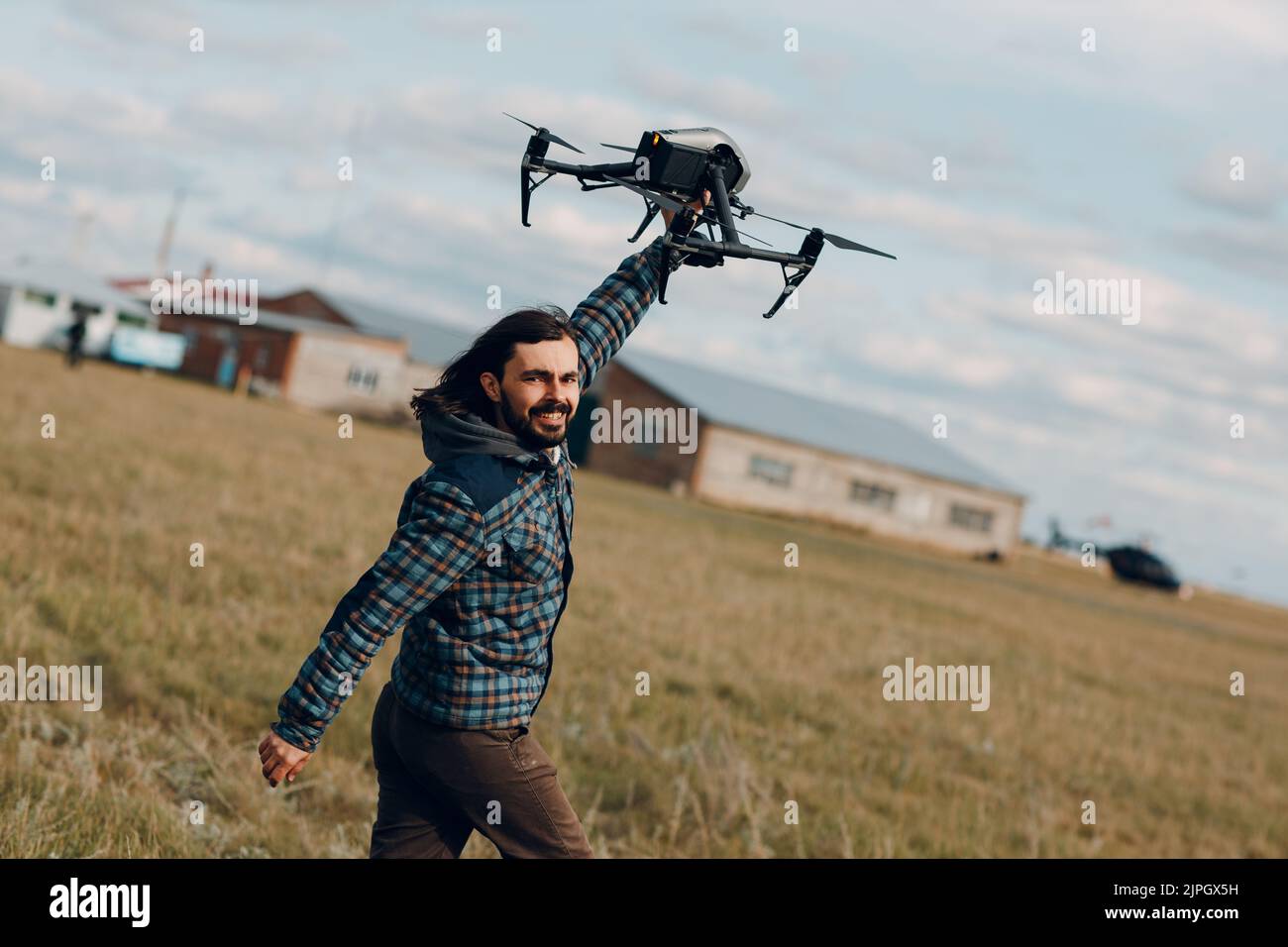 Man running in field aerial hi-res stock photography and images - Alamy