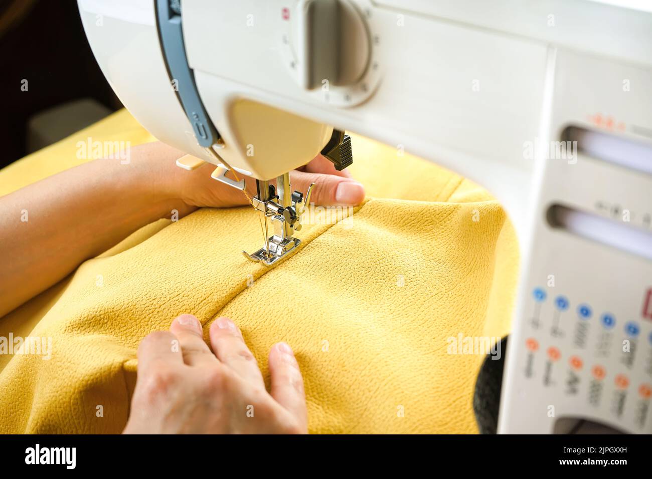 Hand sewing clothes hi-res stock photography and images - Alamy