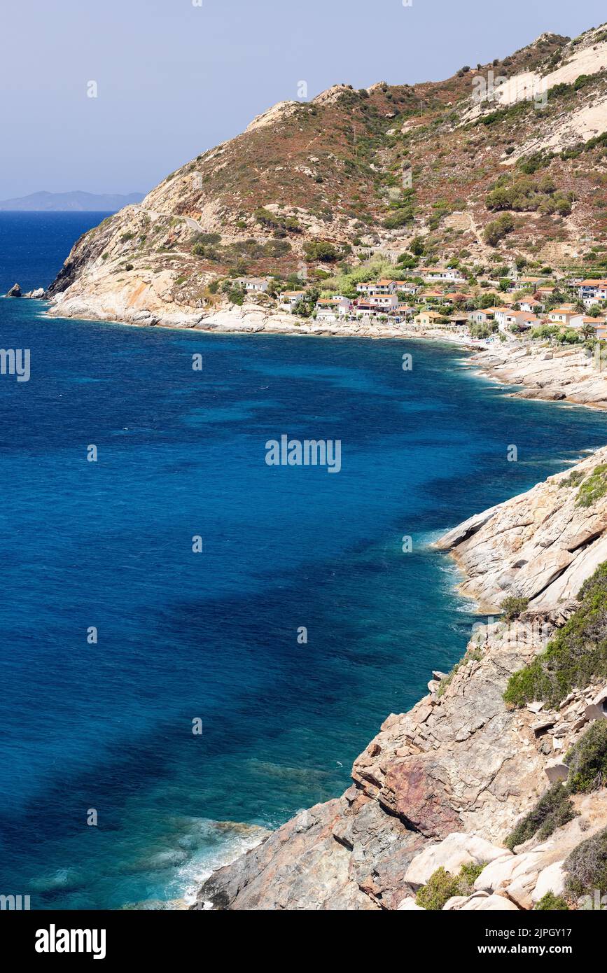 Vertical shot of Two dominant colors on the island of Elba: the yellow ...