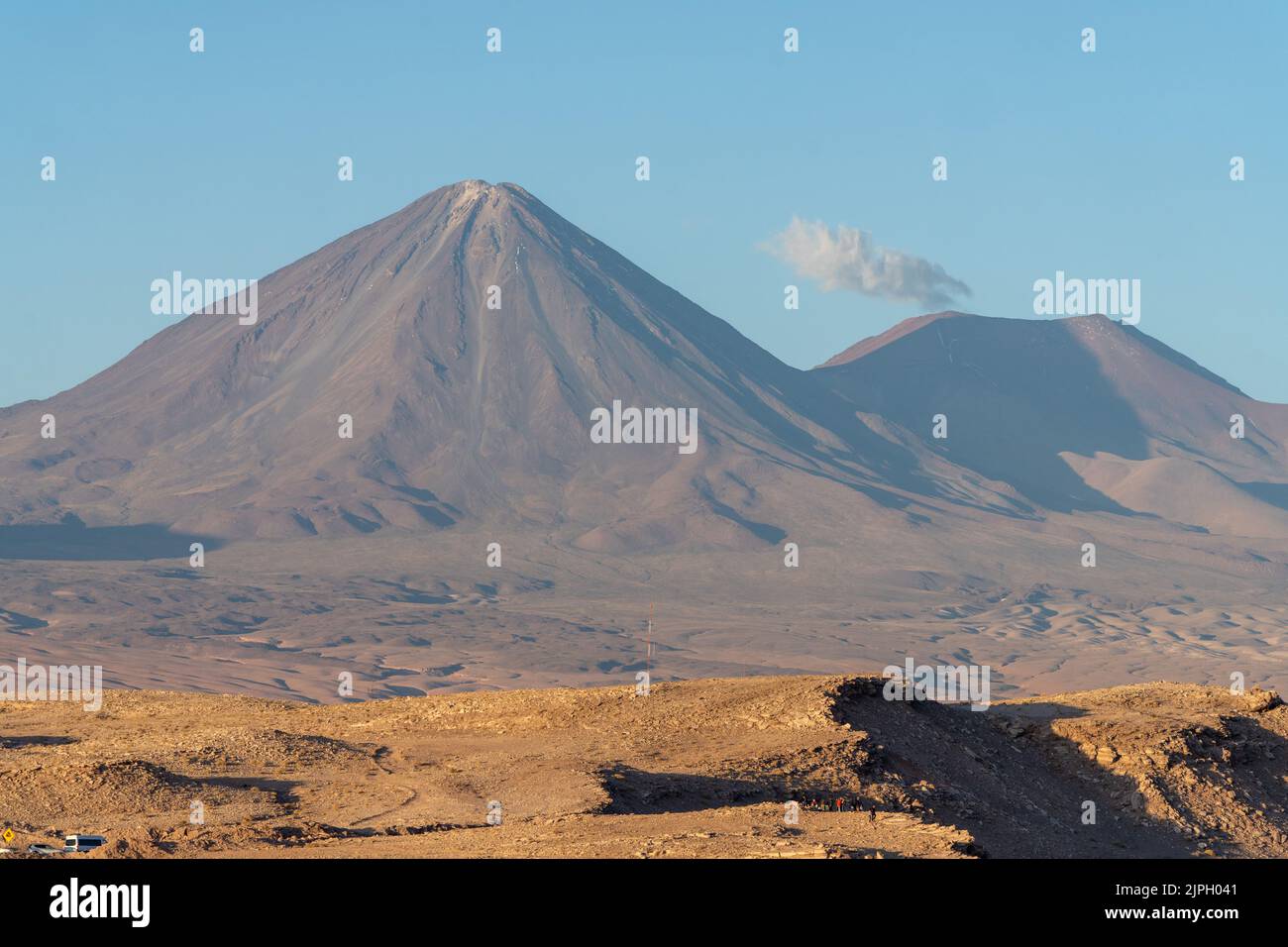 Licancabur Volcano with Juriques Volcano (right) in the Andes at sunset ...