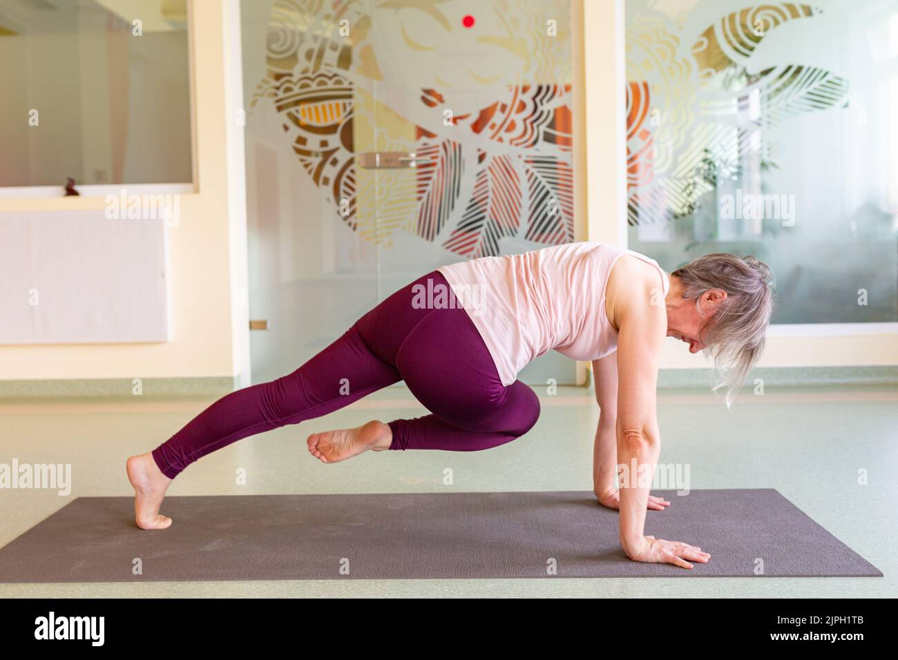Developing core strength by practicing yoga asanas Stock Photo - Alamy