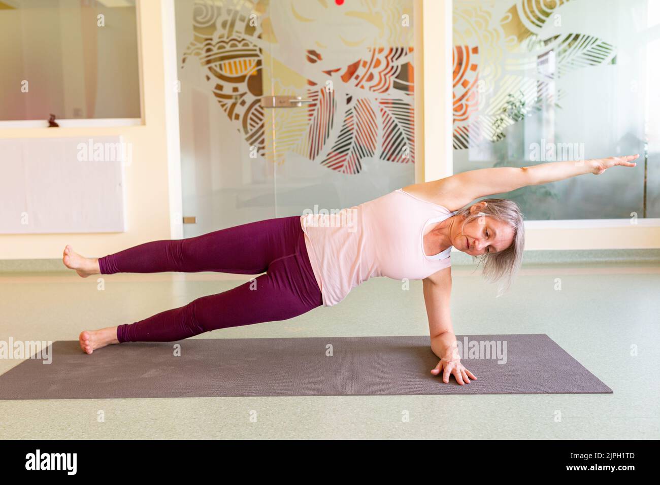 Developing core strength by practicing yoga asanas Stock Photo - Alamy