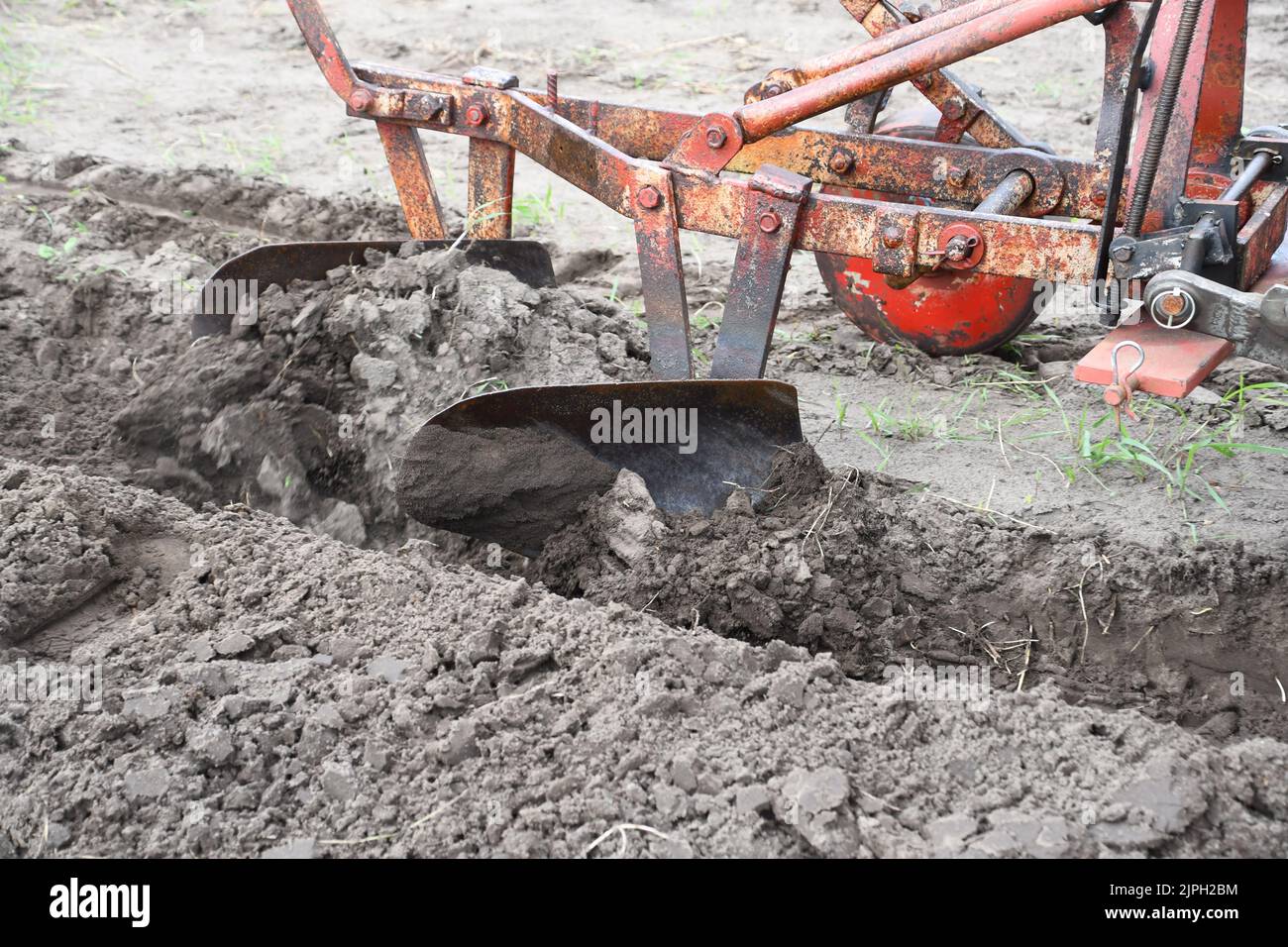 plowing, plough, plough share, ploughs, plough shares Stock Photo - Alamy