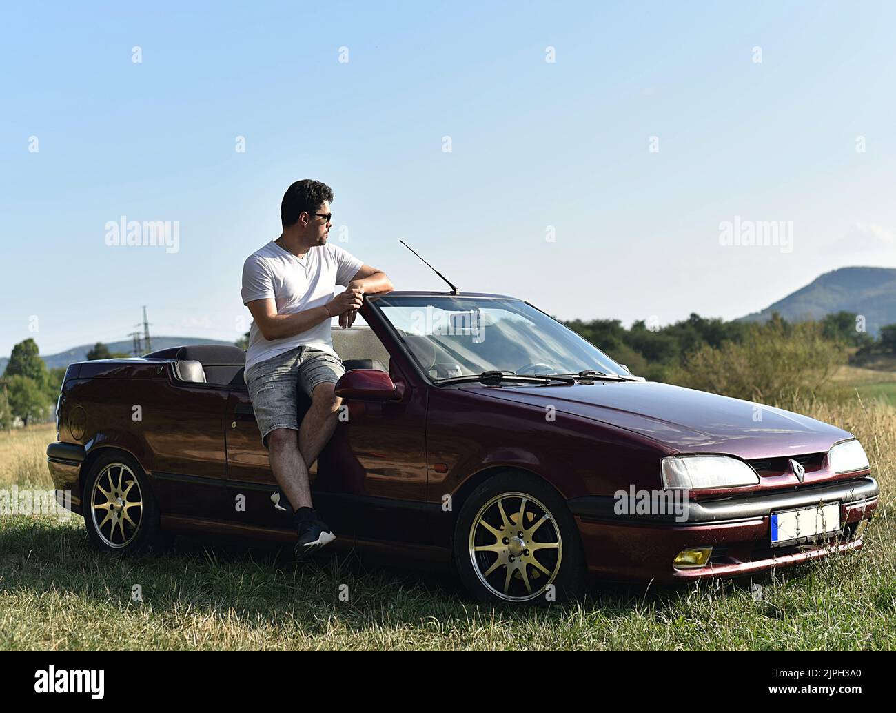 Classic car driving sunset hi-res stock photography and images - Alamy