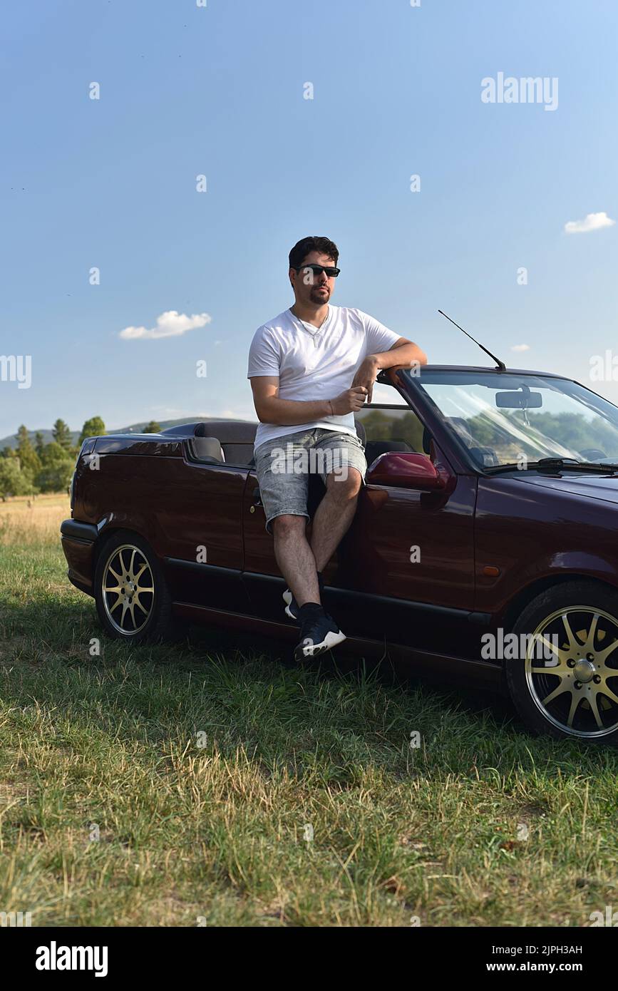 Man driving car sunset interior hi-res stock photography and images - Alamy