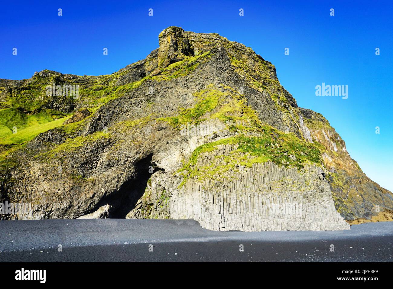 Basalt rocks and cave at Reynisfjara Black Beach in Iceland Stock Photo ...