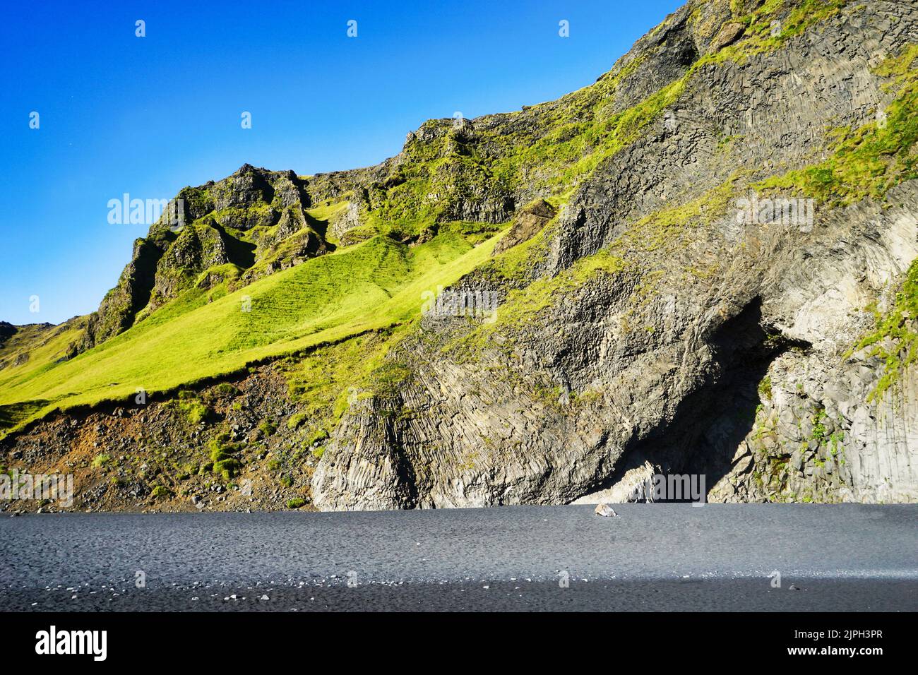 Basalt rocks and cave at Reynisfjara Black Beach in Iceland Stock Photo ...