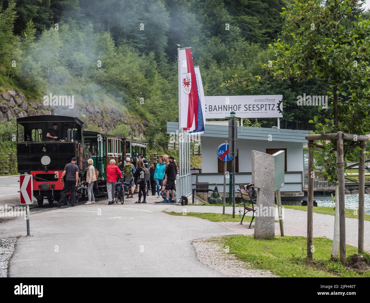 This is the famous cog railway steam train with its vintage carriages ...