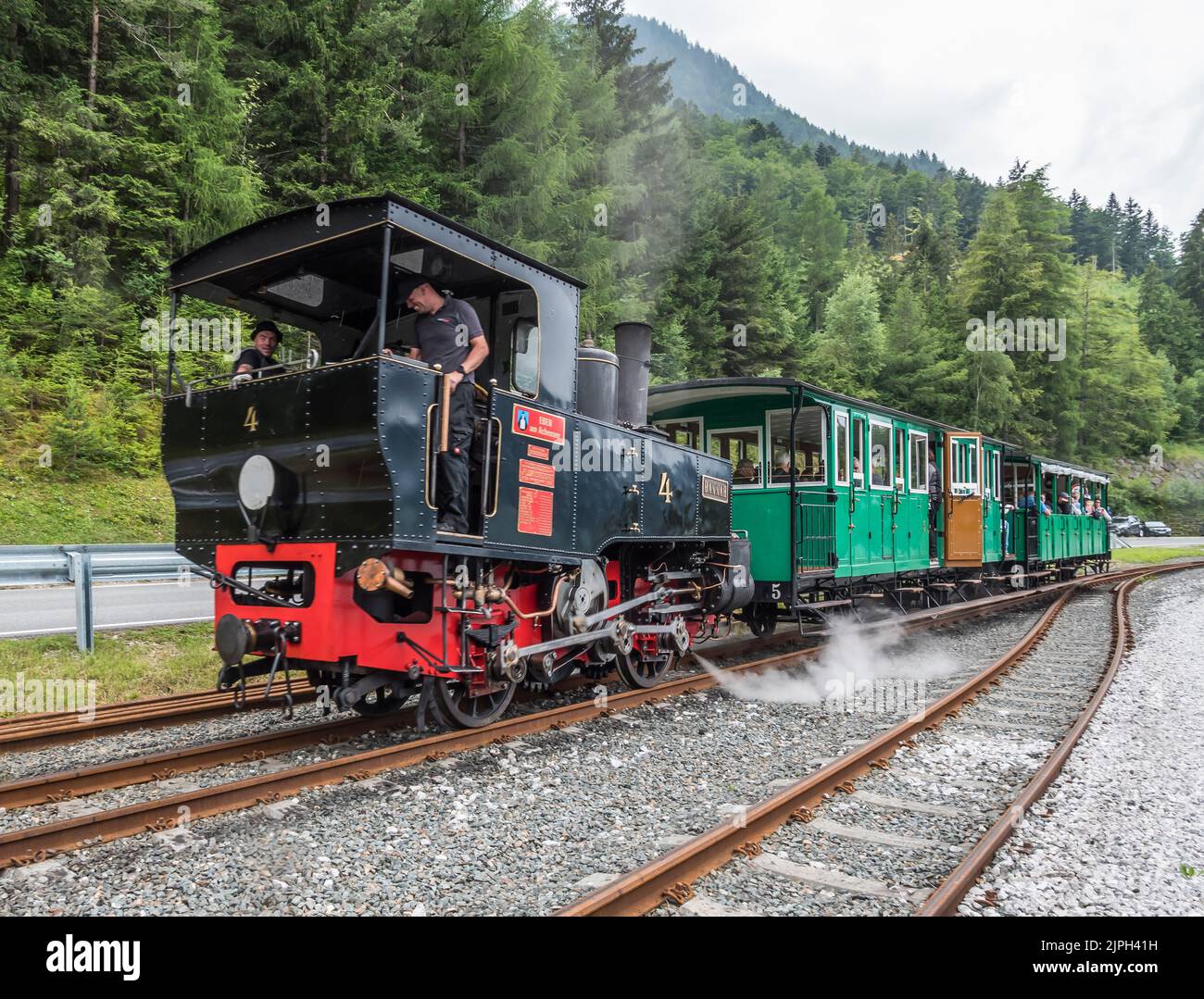 This is the famous cog railway steam train with its vintage carriages tourist attraction that ...