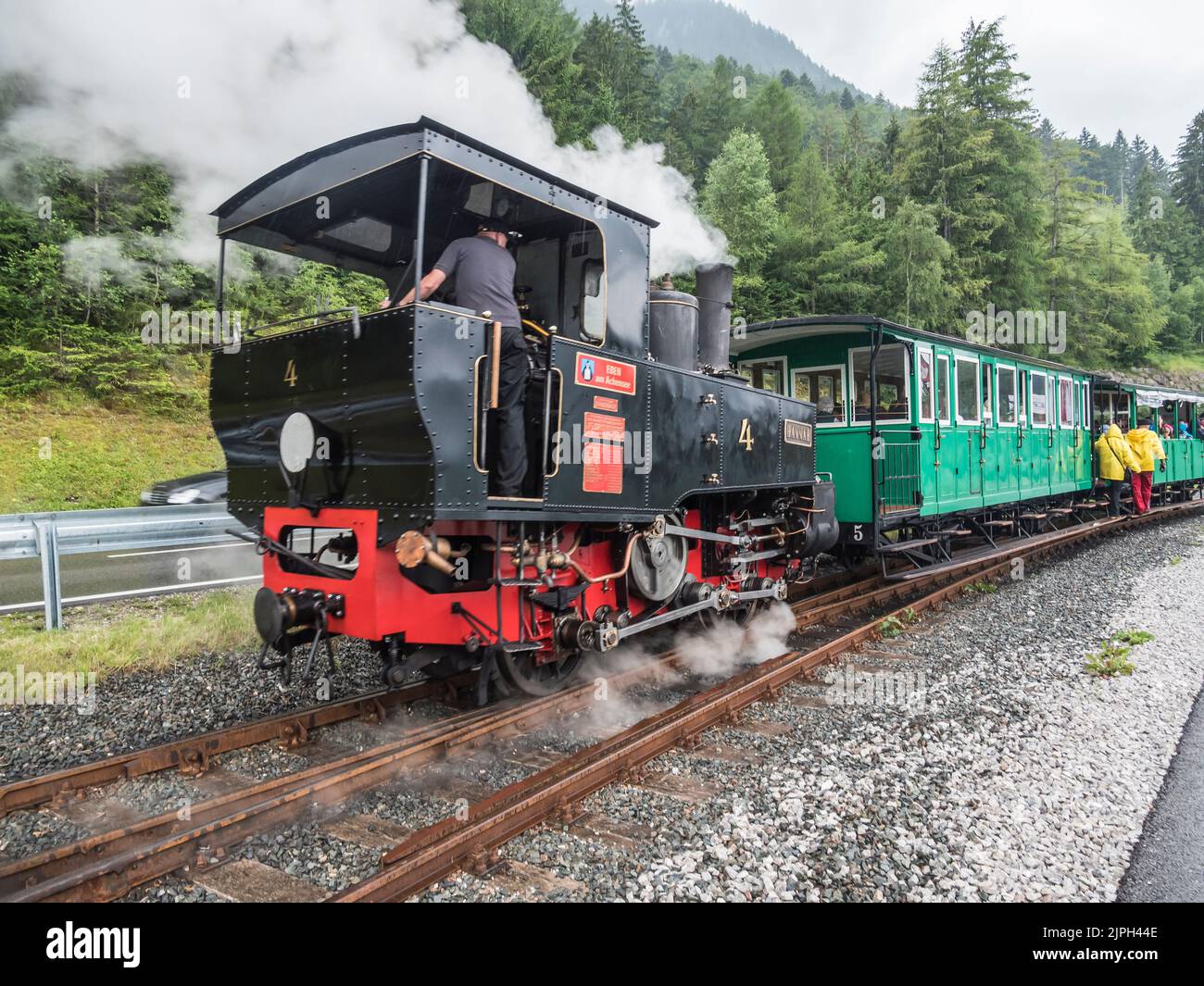 This is the famous cog railway steam train with its vintage carriages ...