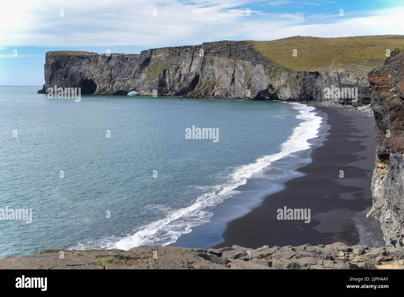 Reynisfjara Black Beach in Iceland, rocky cliffs Stock Photo - Alamy