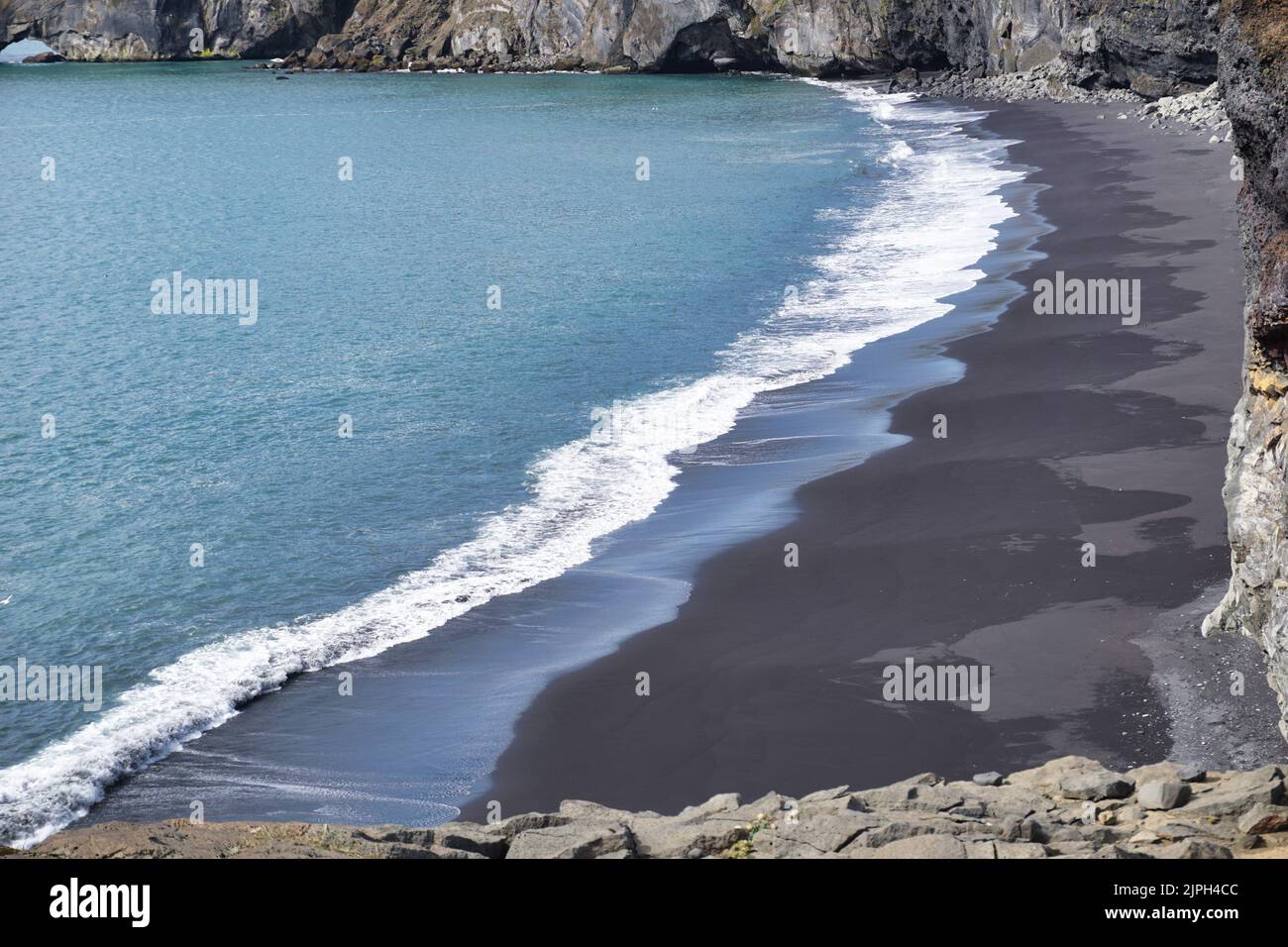 Reynisfjara Black Beach in Iceland, rocky cliffs Stock Photo - Alamy