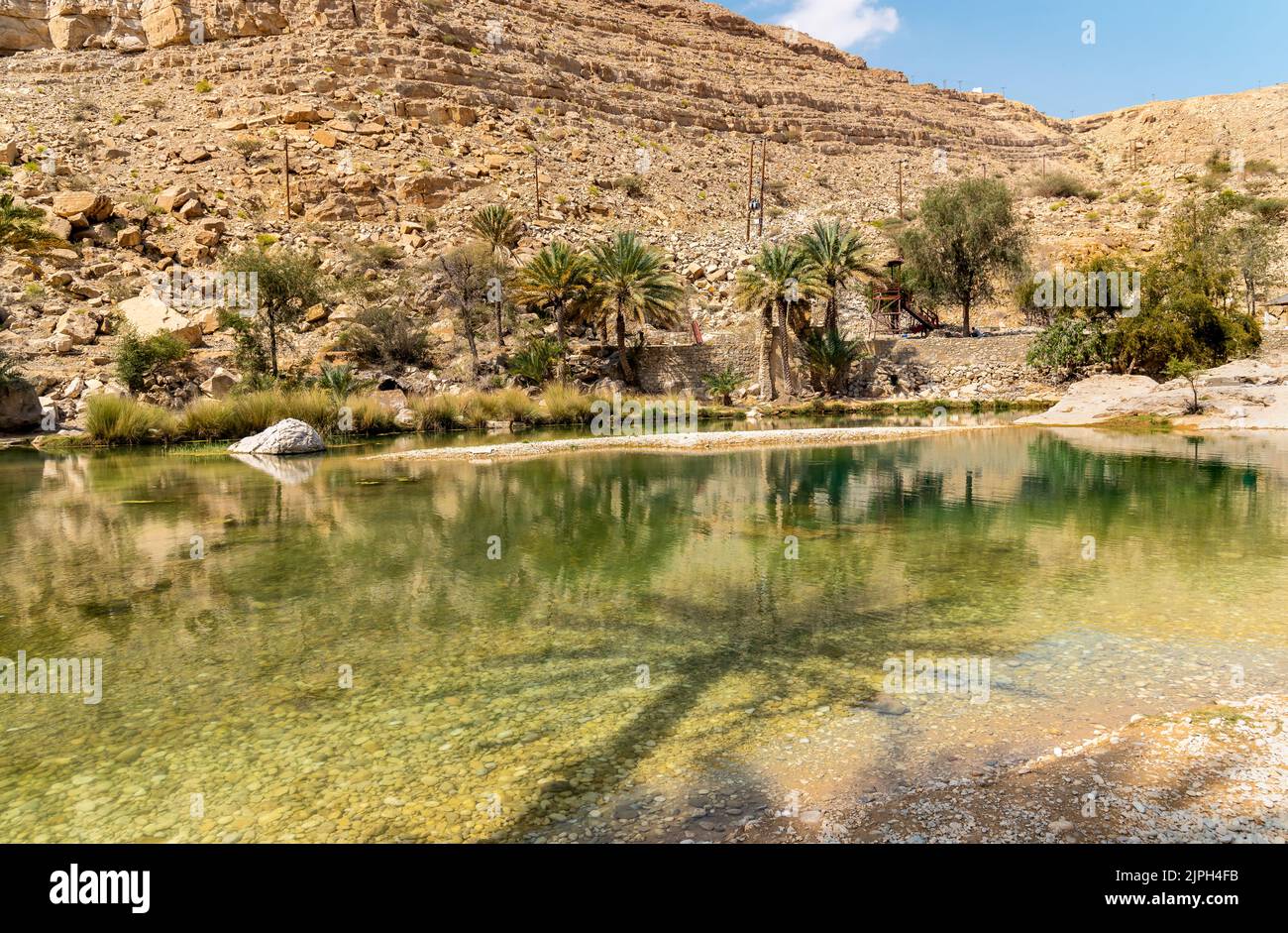 View of the Wadi Bani Khalid oasis in the desert in Sultanate of Oman ...
