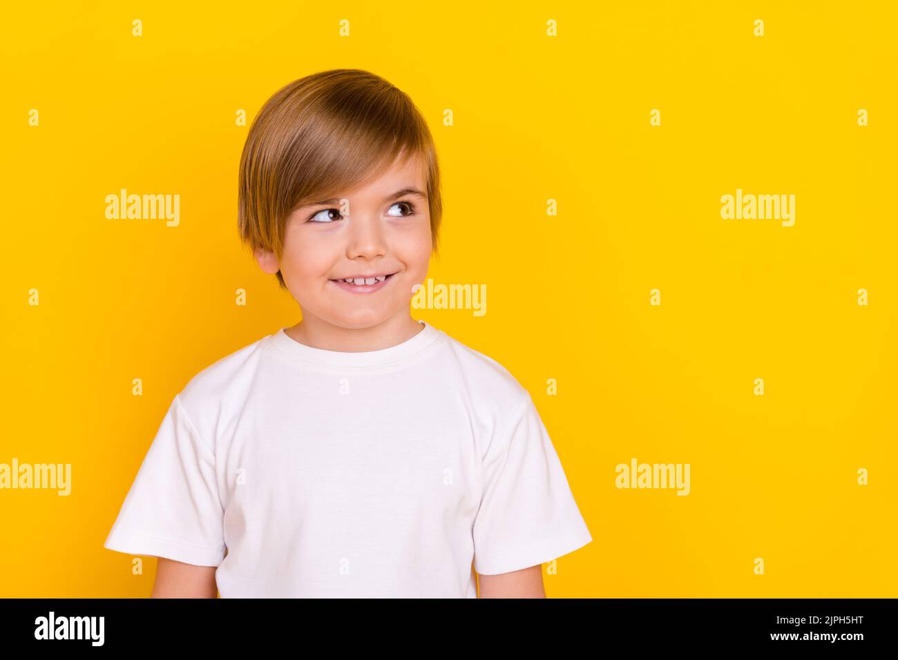 Portrait of attractive sly minded cheerful pre-teen boy deciding copy ...