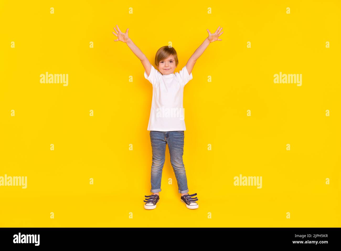 Full length body size view of handsome cheerful funky pre-teen boy ...