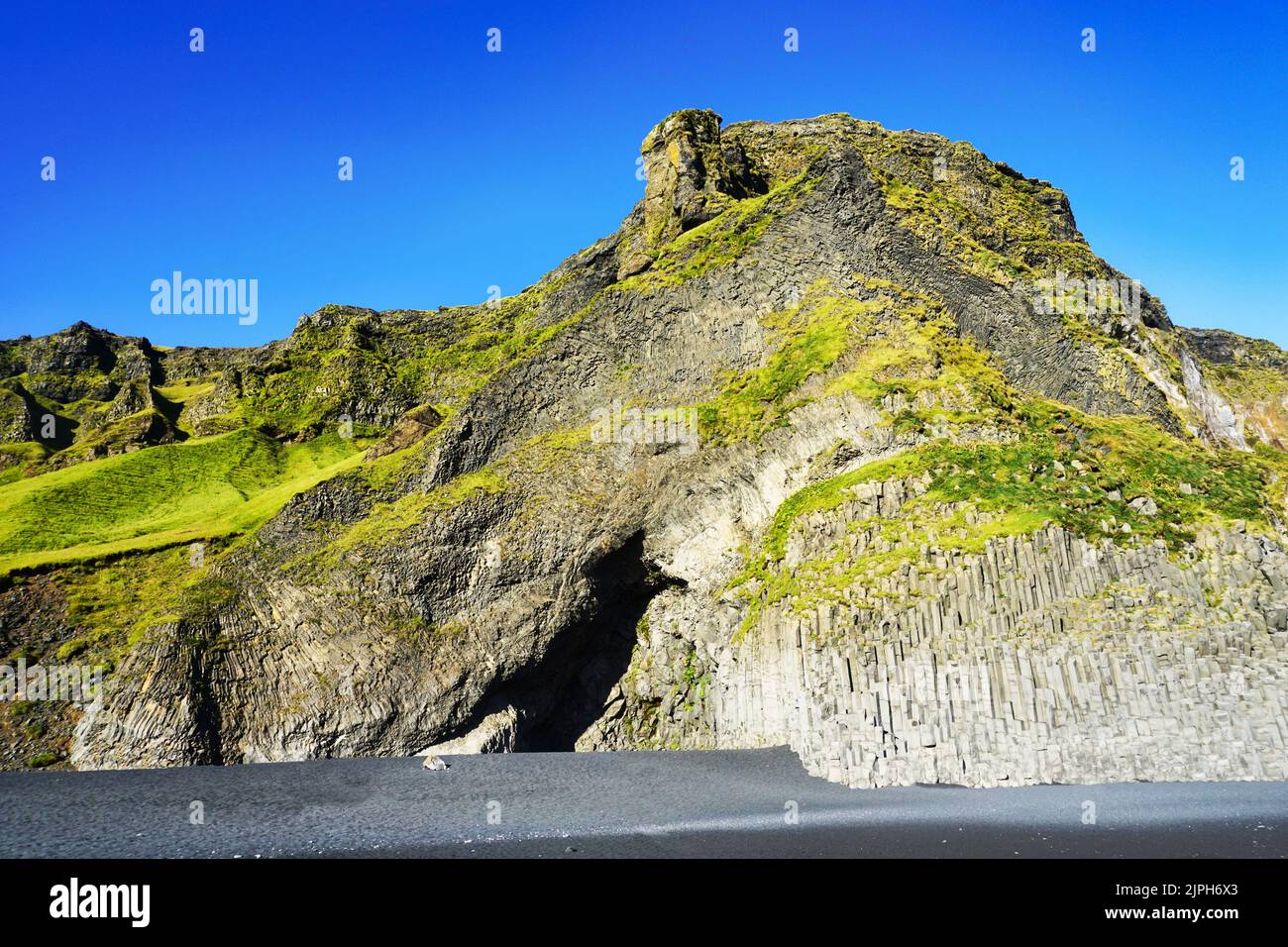 Basalt rocks and cave at Reynisfjara Black Beach in Iceland Stock Photo ...