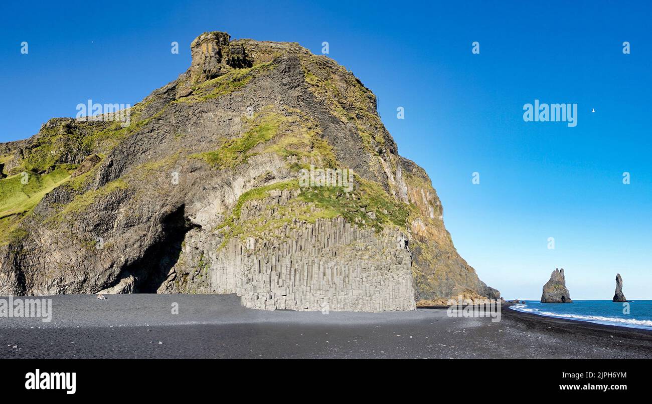 Basalt rocks and cave at Reynisfjara Black Beach in Iceland Stock Photo ...