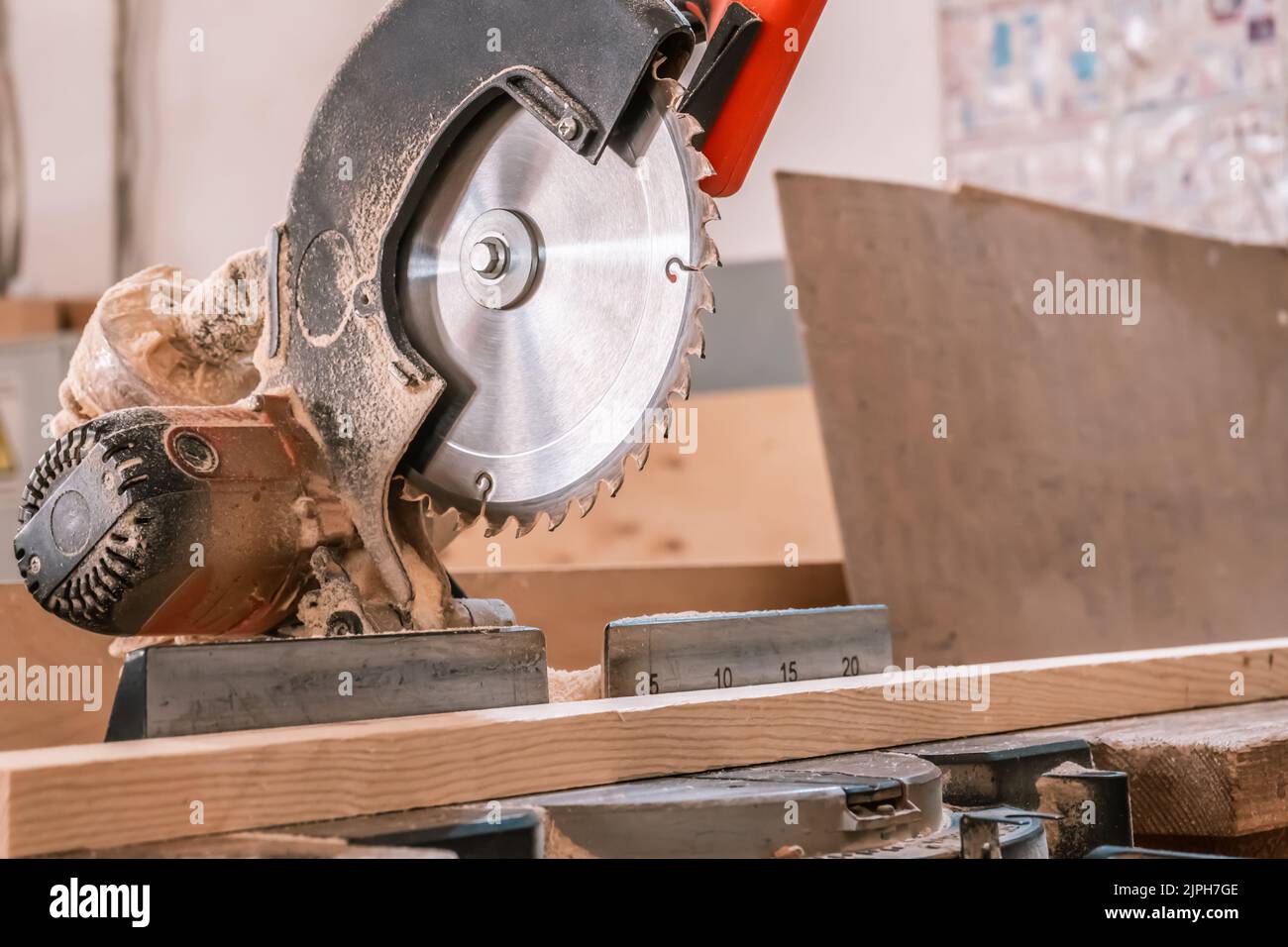Sawing machine for wood in the workshop for the production of furniture ...