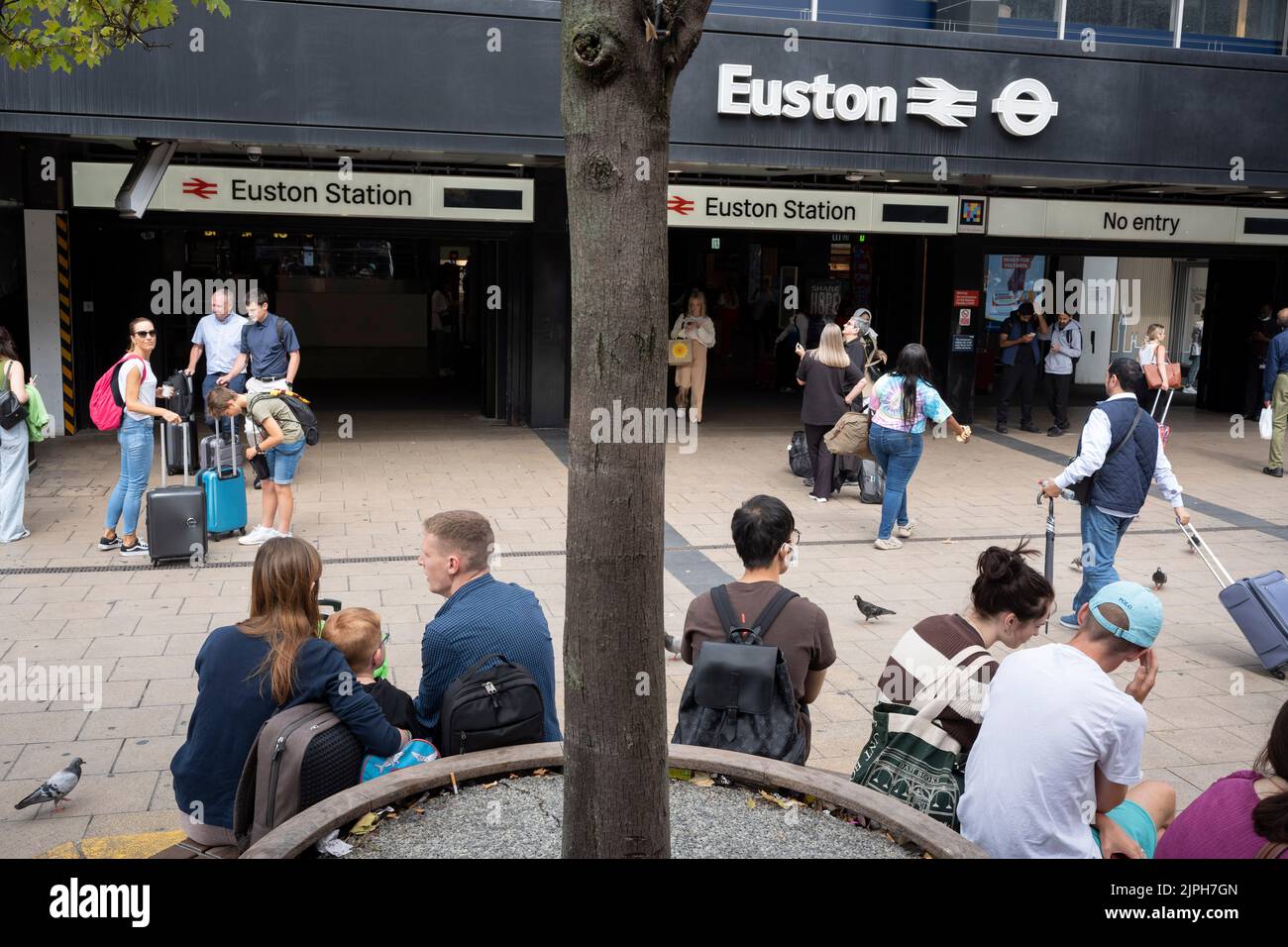 Hopeful passengers outside Euston Station during another day of rail ...