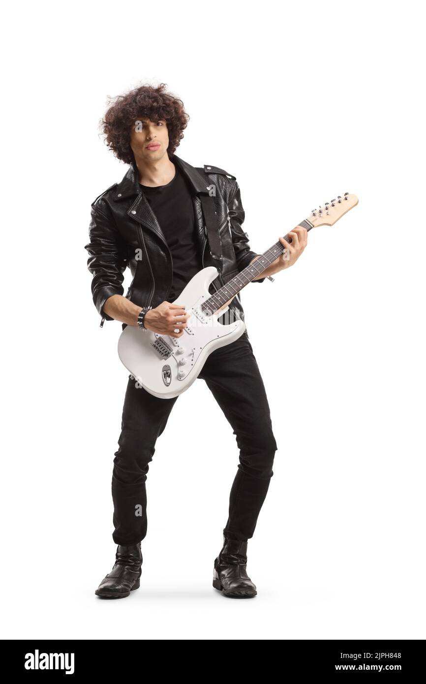 Full length shot of a man in a black leather jacket playing an electric ...
