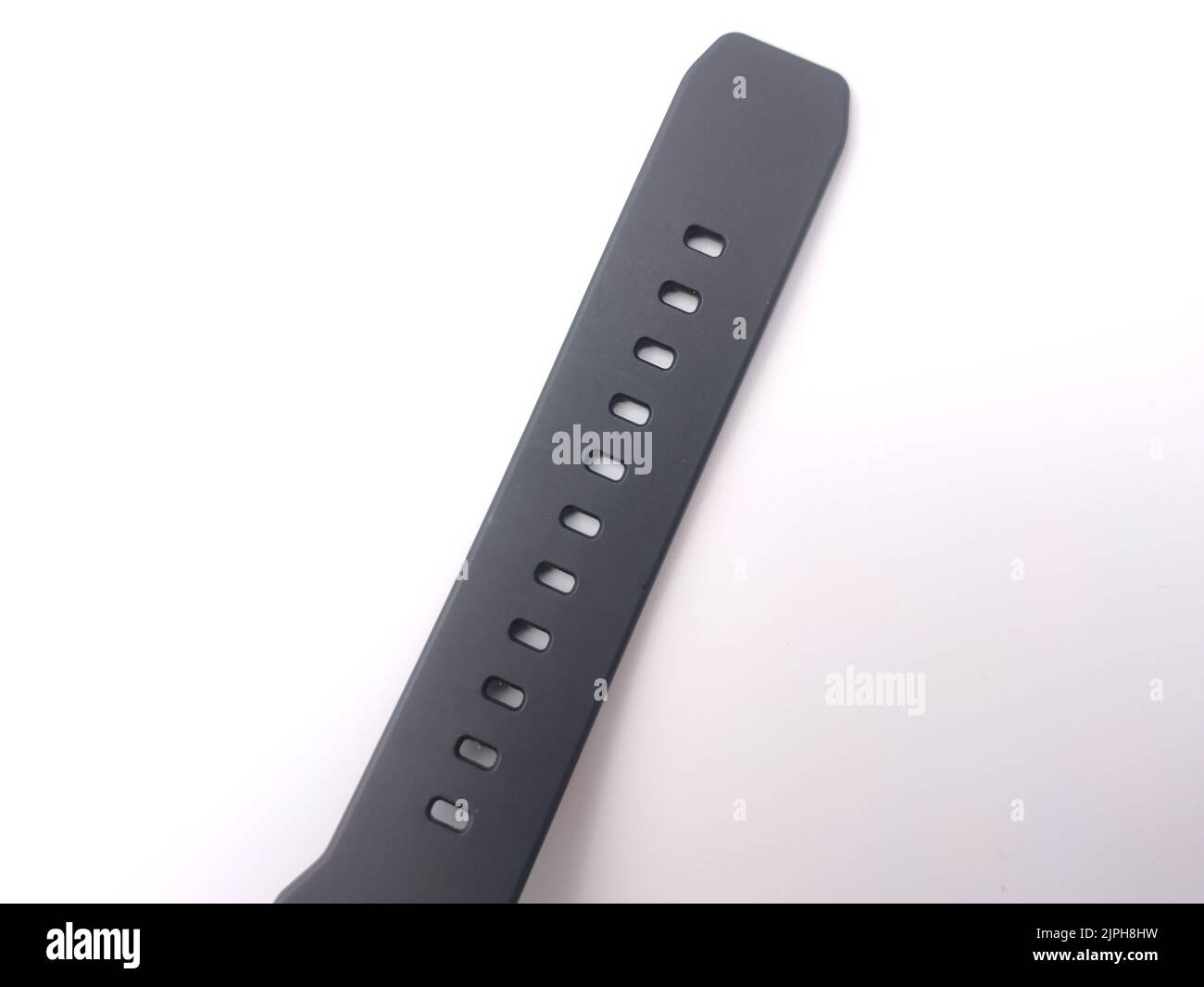 A top view of a black rubber watch band Stock Photo - Alamy