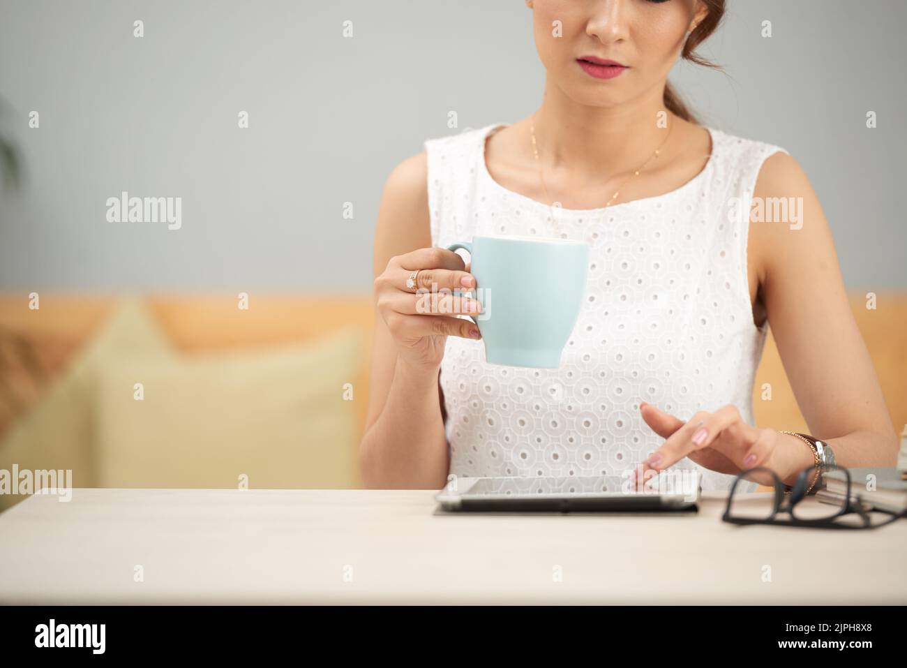 Business woman drinking tea hi-res stock photography and images - Alamy