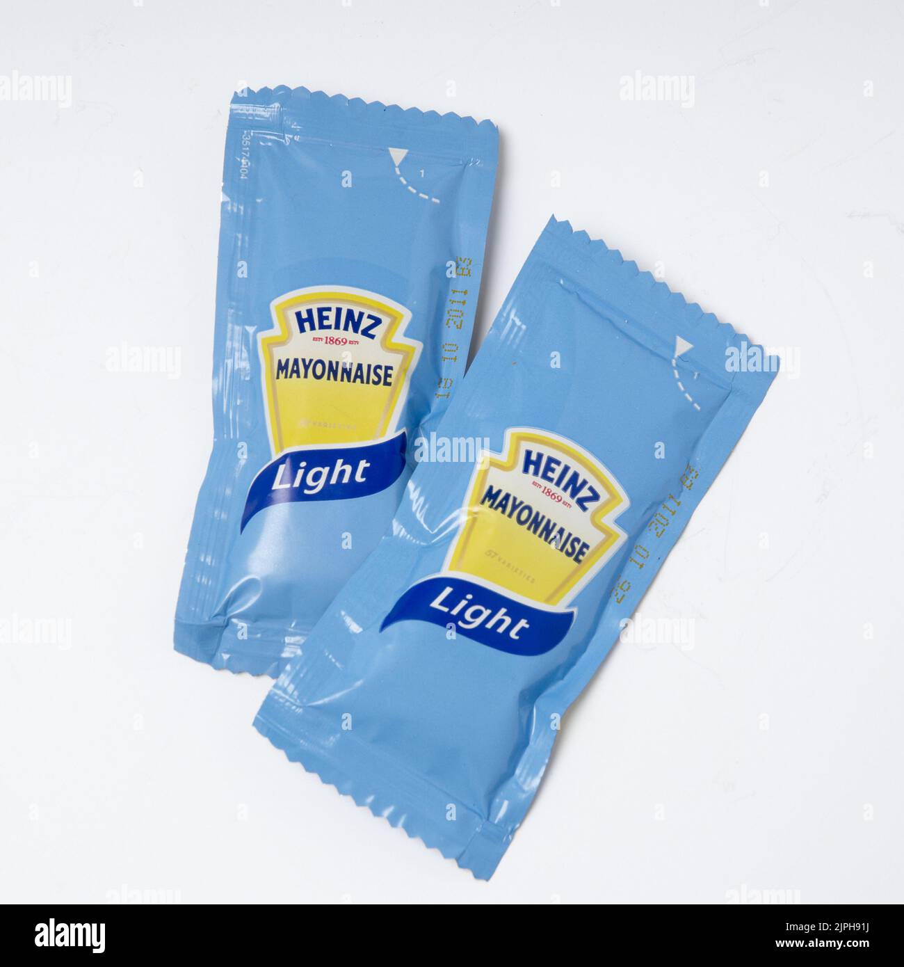Two sachets of Heinz Light Mayonnaise on white background Stock Photo ...