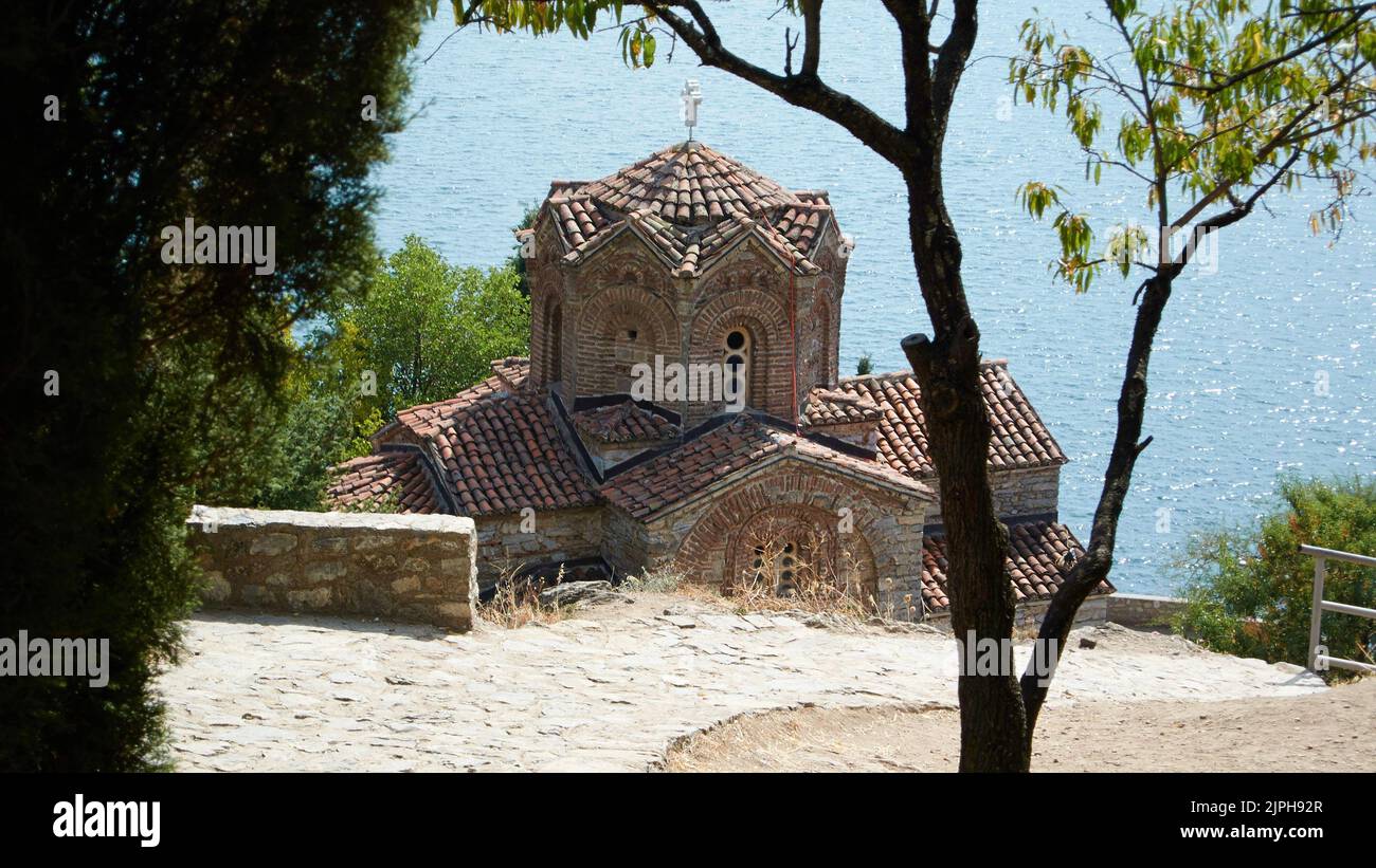 The Church of St. John at Kaneo, situated on the cliff over Kaneo Beach ...