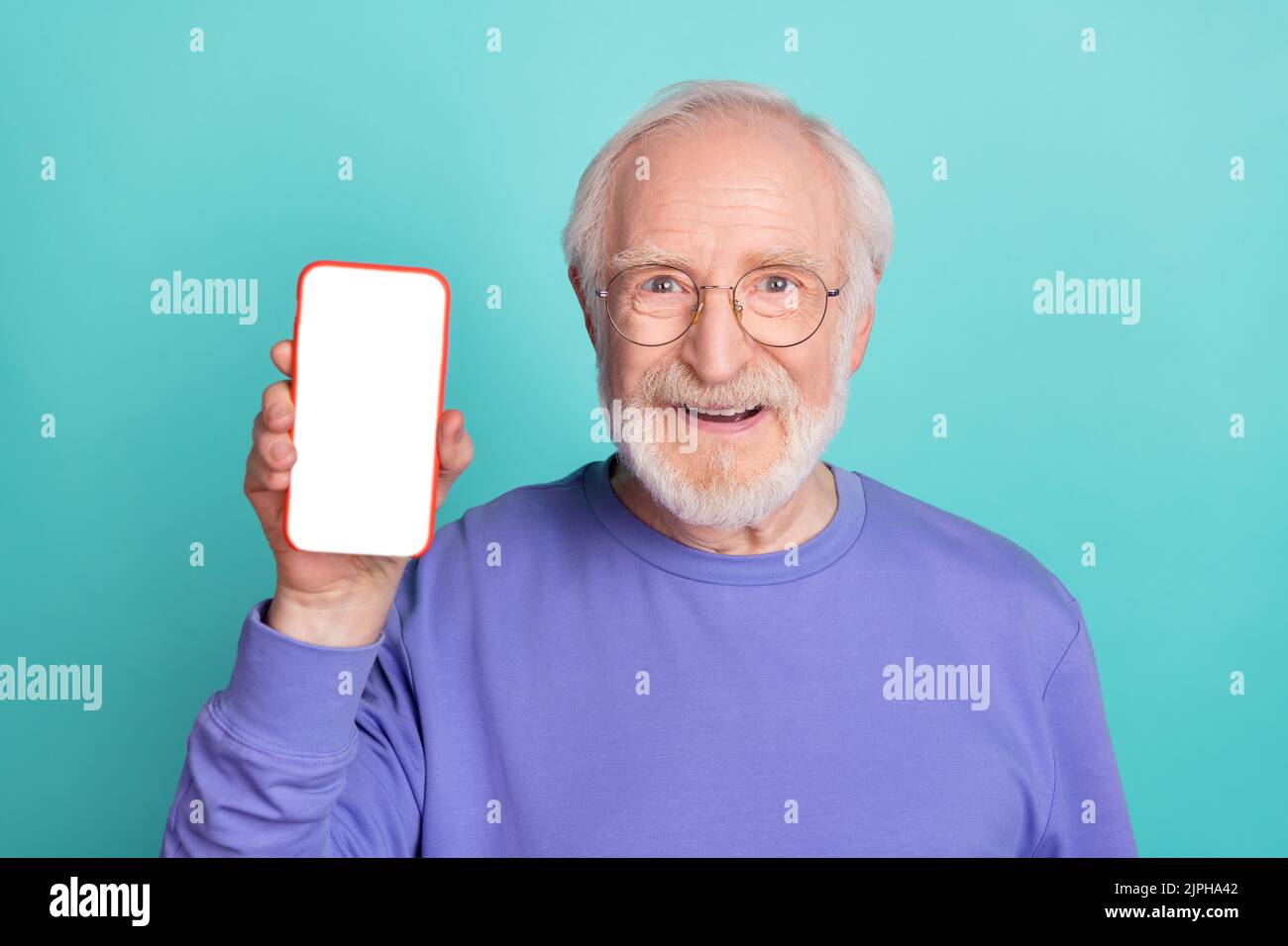 Photo Of Positive Person Hand Hold Demonstrate Empty Space Telephone Display Isolated On Emerald