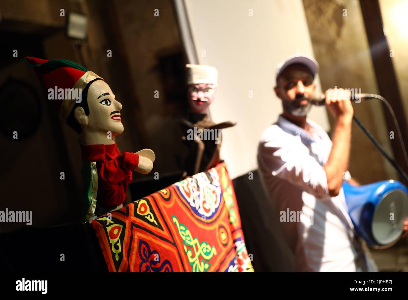 Cairo, Egypt. 16th Aug, 2022. Artists perform during an Aragoz puppet ...