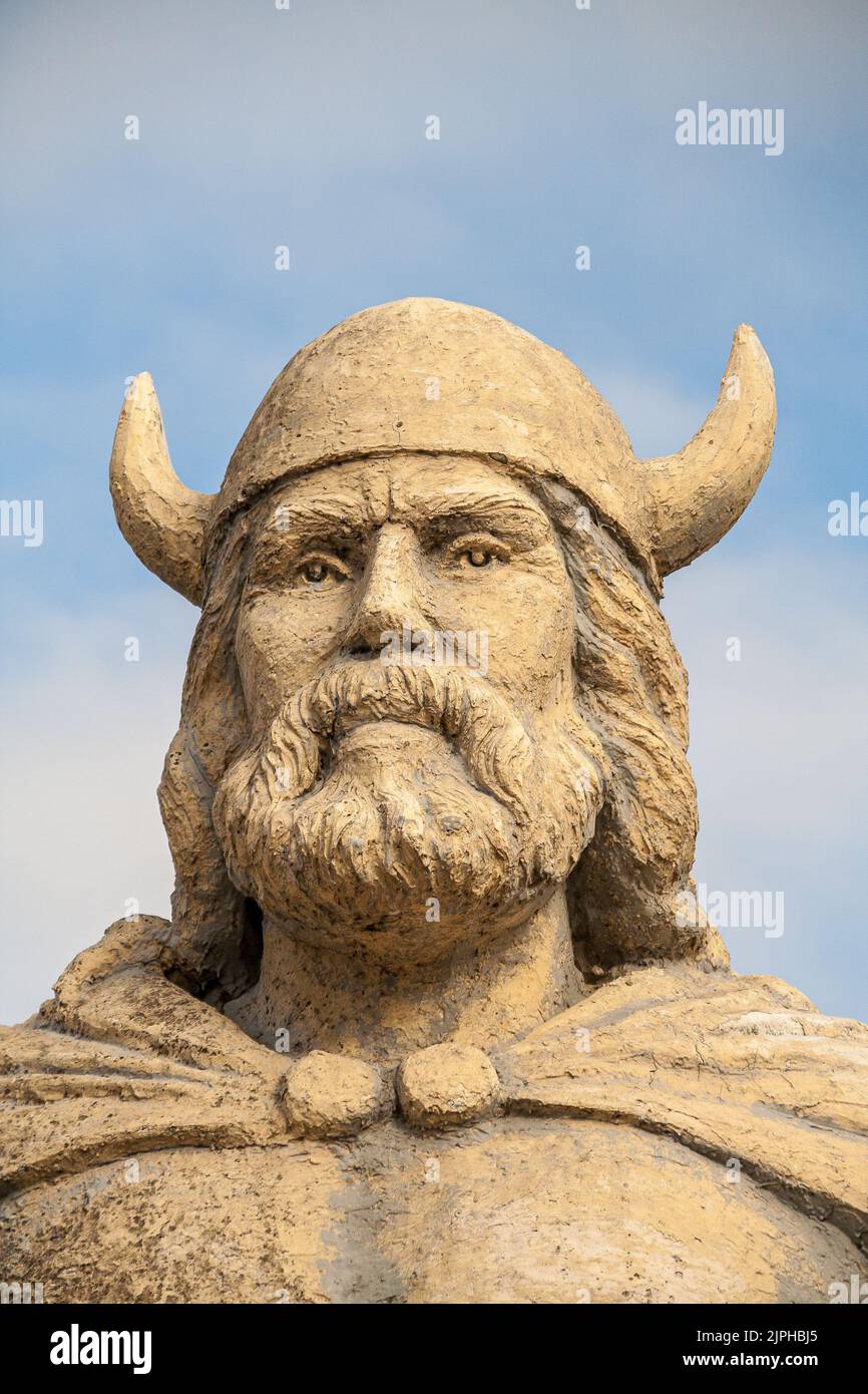Front view of head of a Viking statue on waterfront of lake Winnipeg in ...