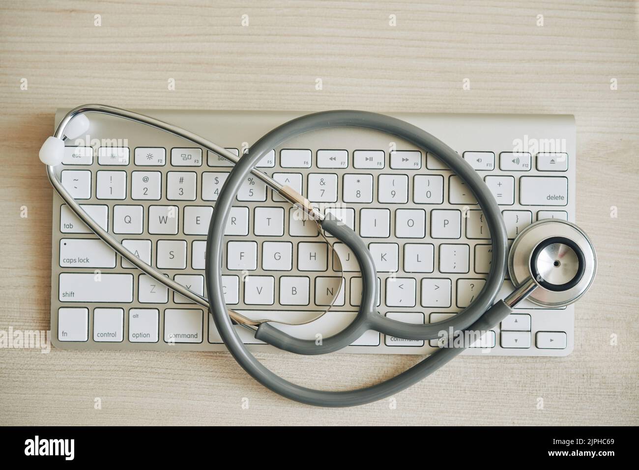 Stethoscope on computer keyboard, view from above Stock Photo - Alamy