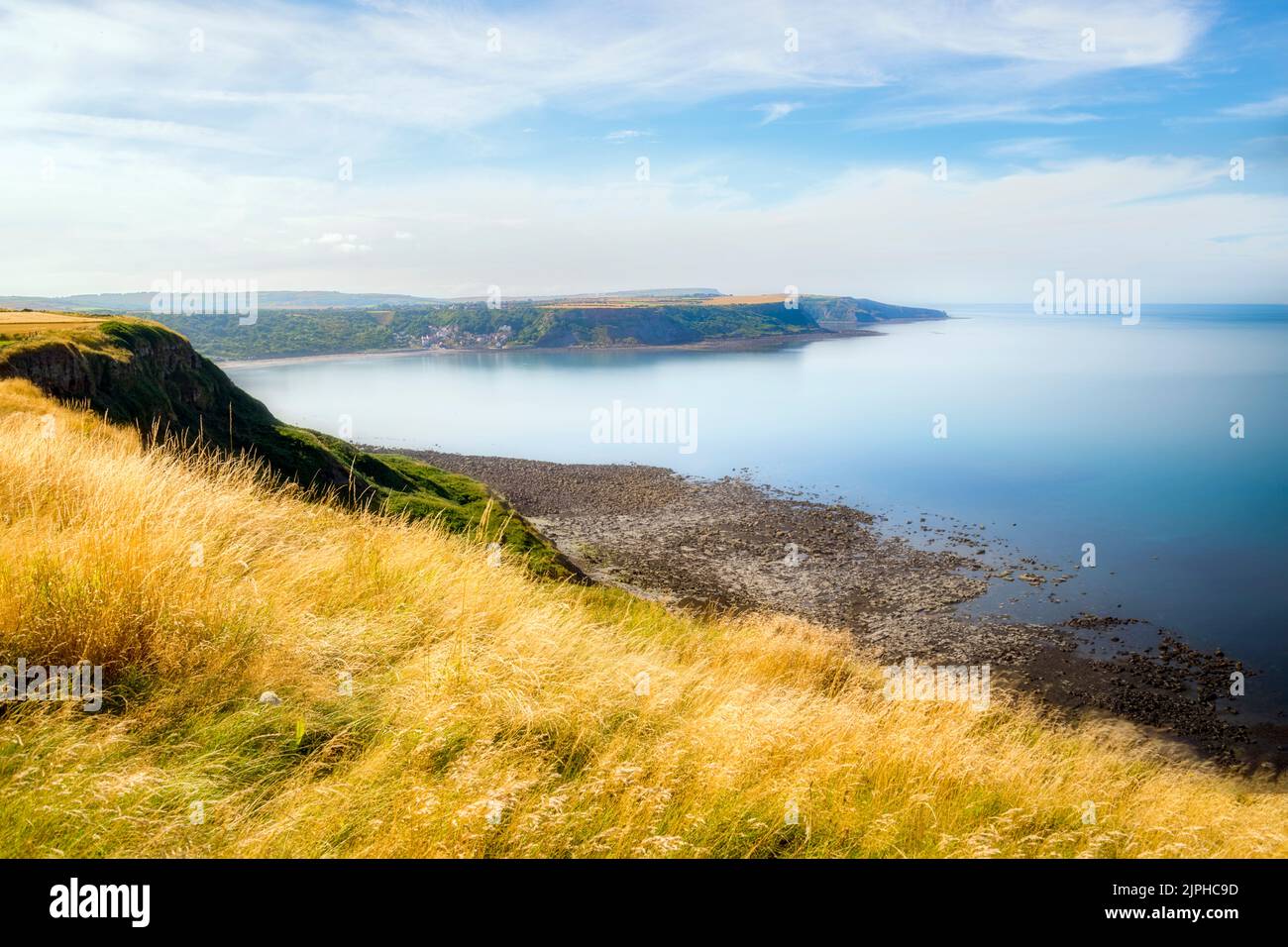 View across the bay from Kettleness to Staithes Stock Photo - Alamy
