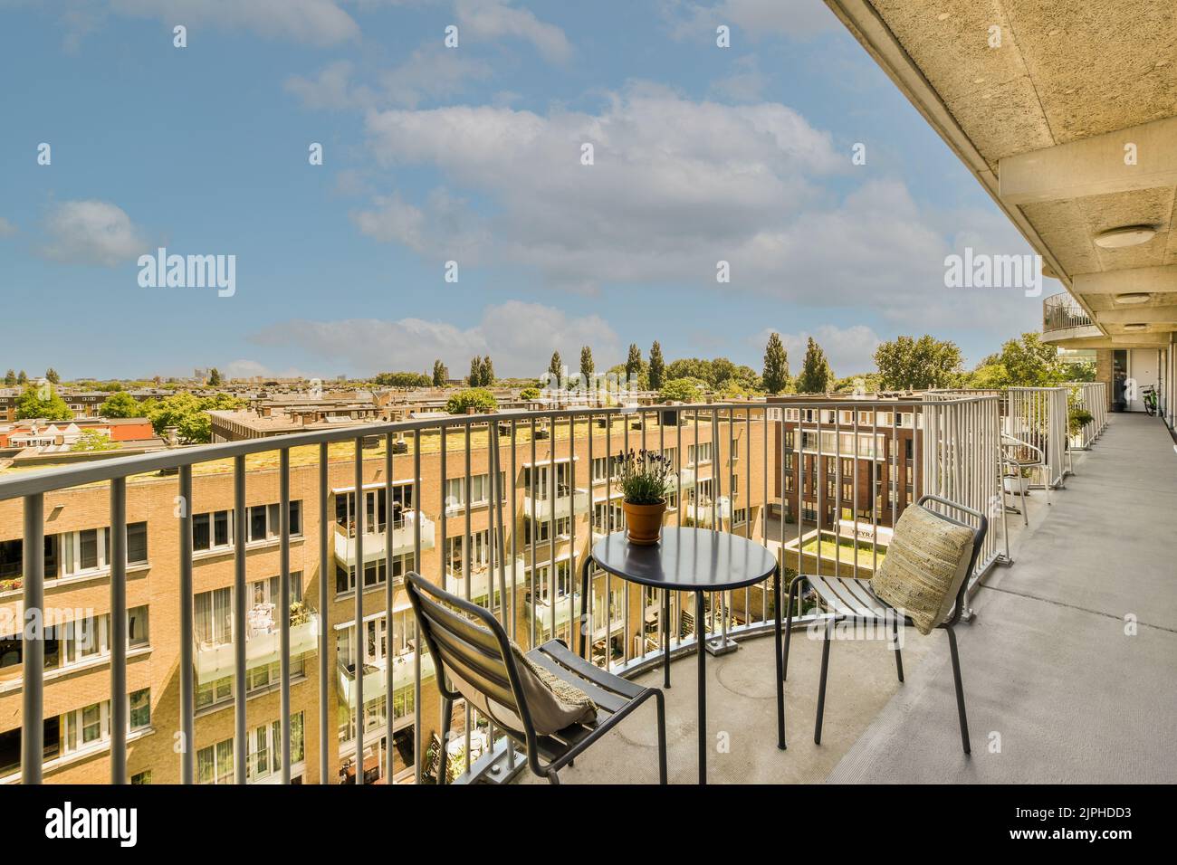 Sitting area in balcony with comfortable furniture around beautiful ...