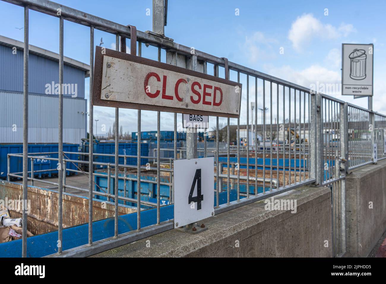 A steel fence in the dump site Stock Photo - Alamy