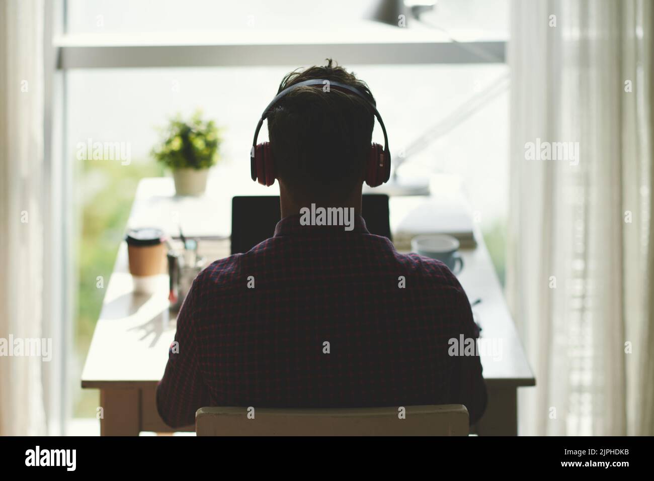 Back view freelancer man hi-res stock photography and images - Alamy