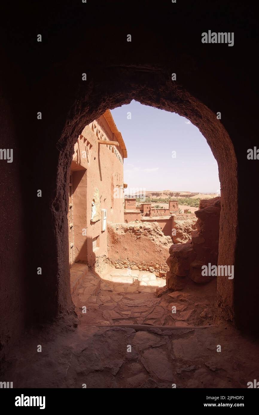 arch against the light, mediterranean architecture, earthen ...